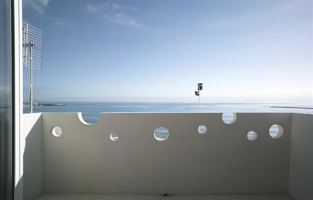 Sinuous Building by Momo Estudio - Architizer