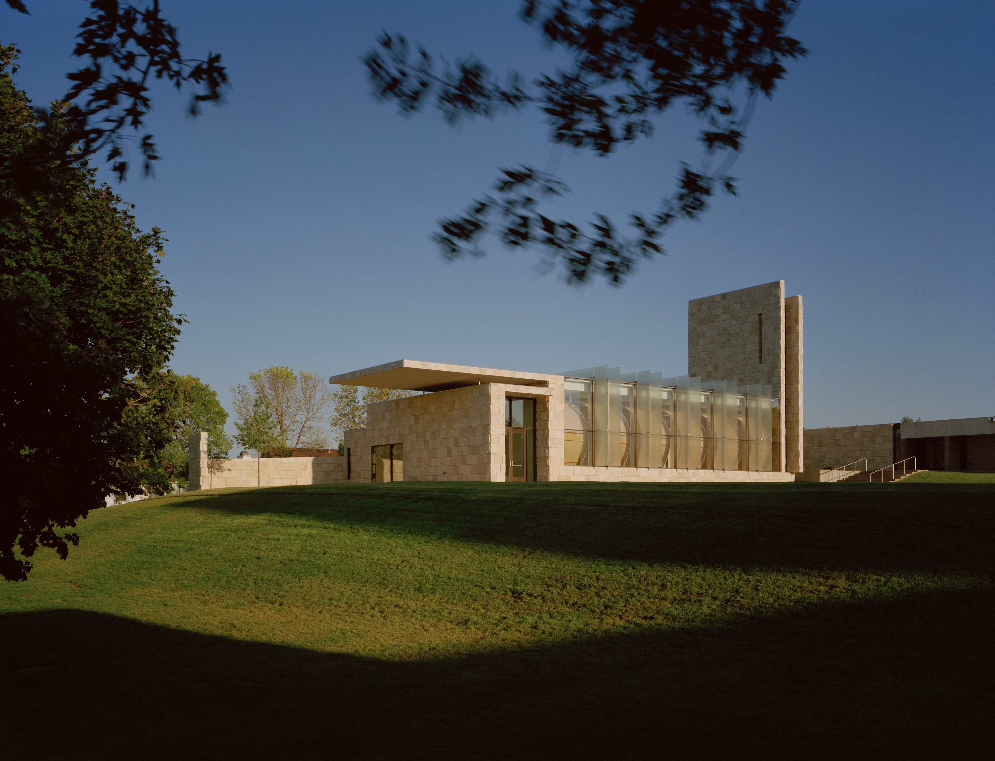 Stone Façades: 8 Slotted Elevations Sculpted by Light - Architizer Journal