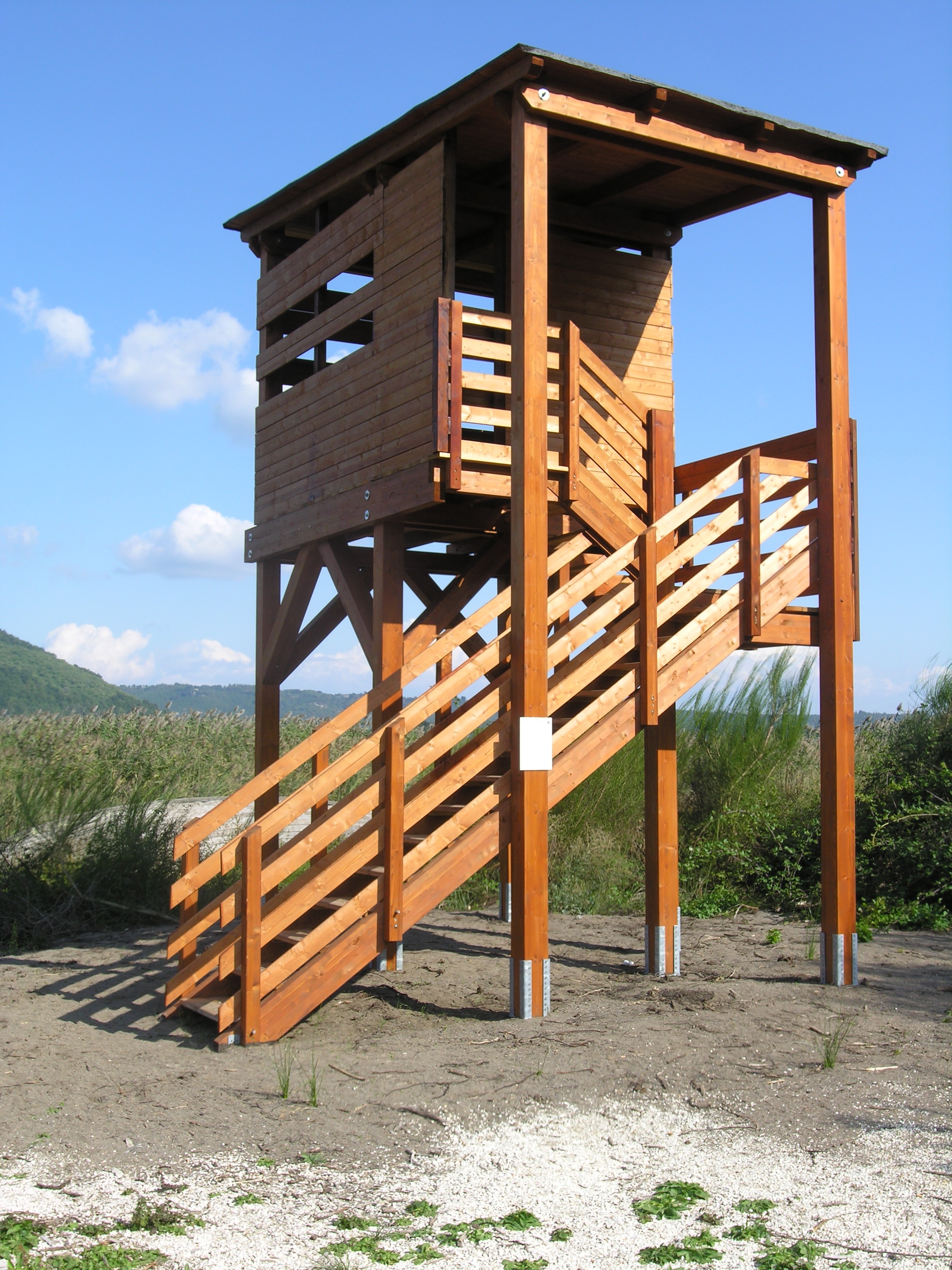 Lake Vico birdwatching towers - Architizer