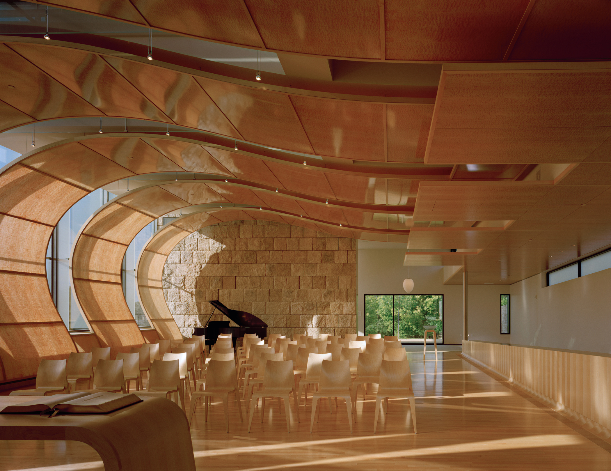 Stone Façades: 8 Slotted Elevations Sculpted by Light - Architizer Journal