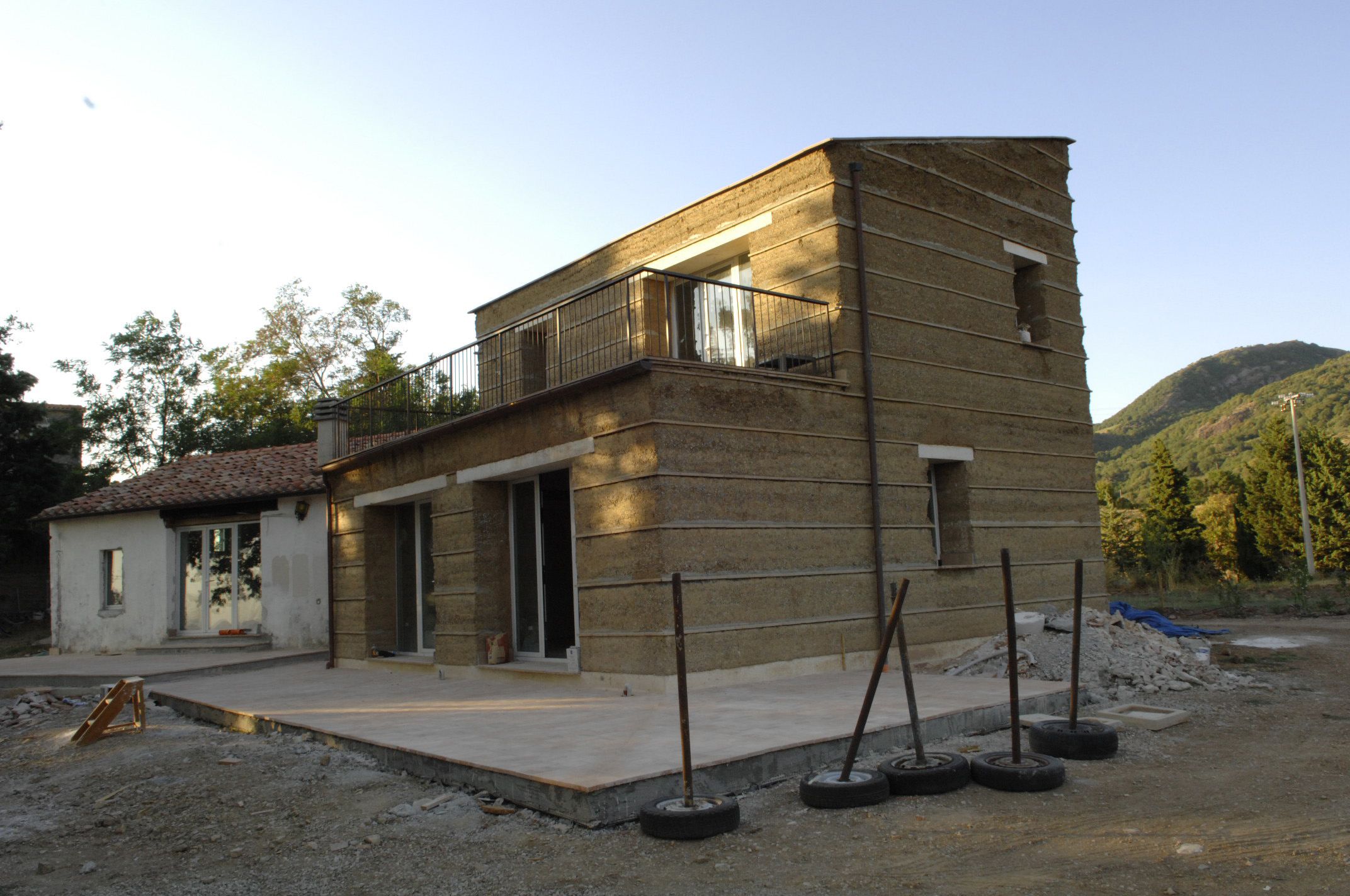 Rammed earth house - Architizer