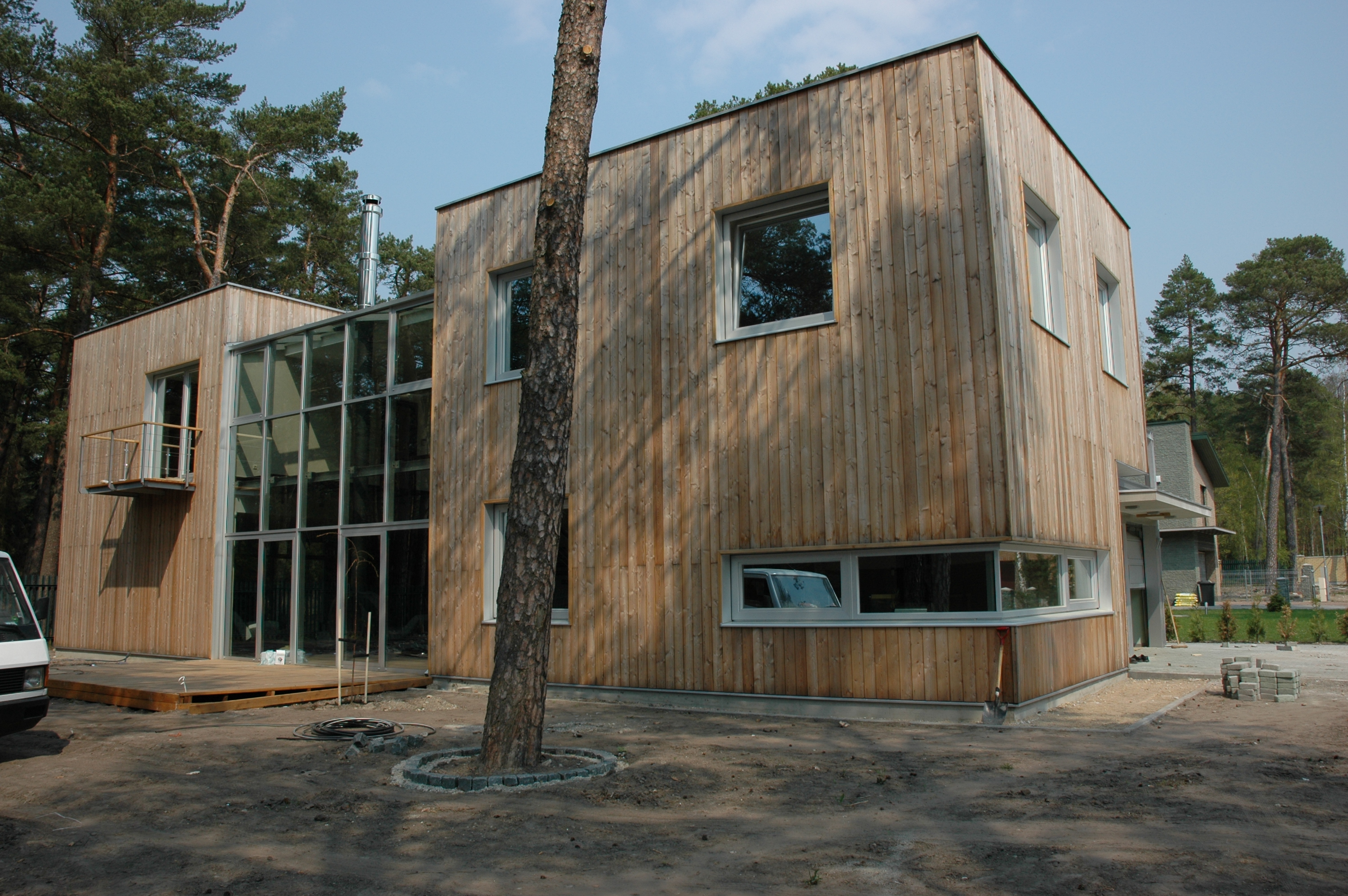 House among the pine trees by MR Architektai - Architizer