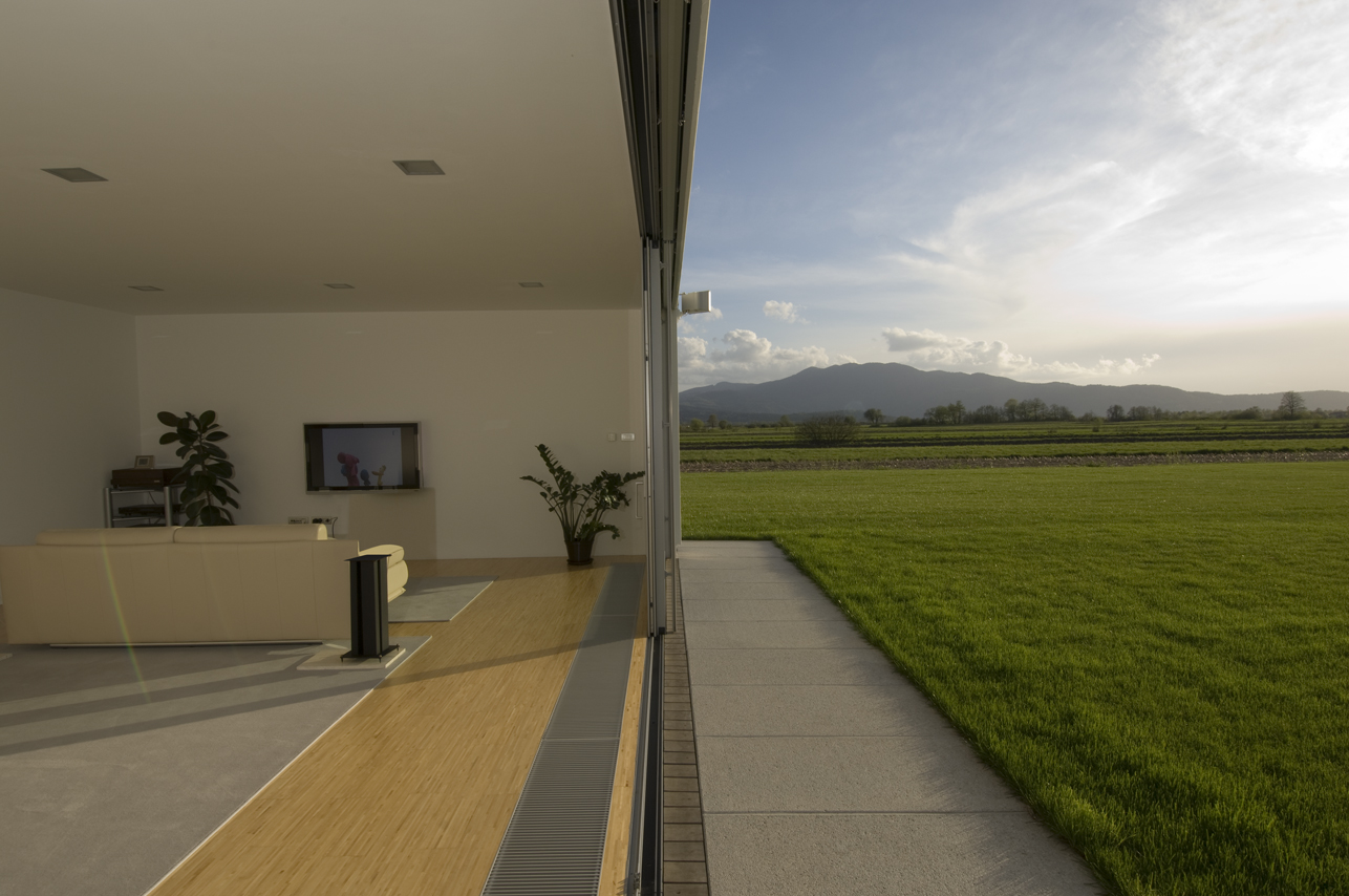 The House behind the wall by Arhitektura - Architizer